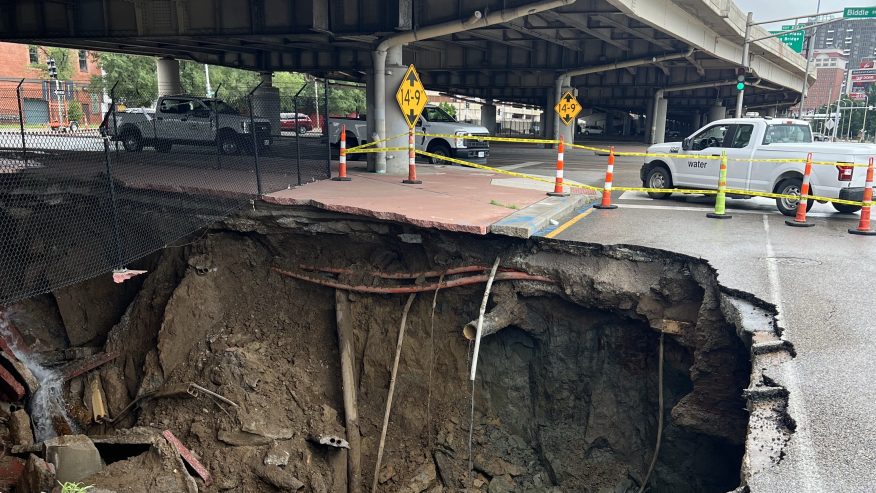 Massive sinkhole opens in downtown St. Louis, interstate closed - The ...